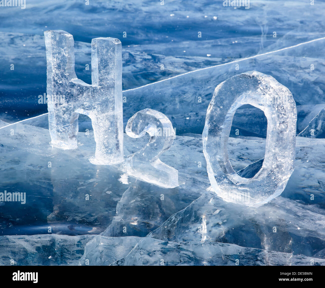 Chemical formula of water H2O made from ice on winter frozen lake ...