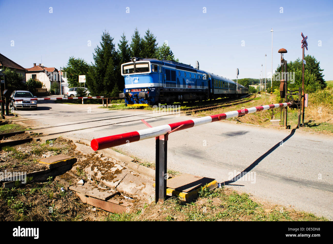 road, railway, level crossing, cross-roads, train Stock Photo - Alamy