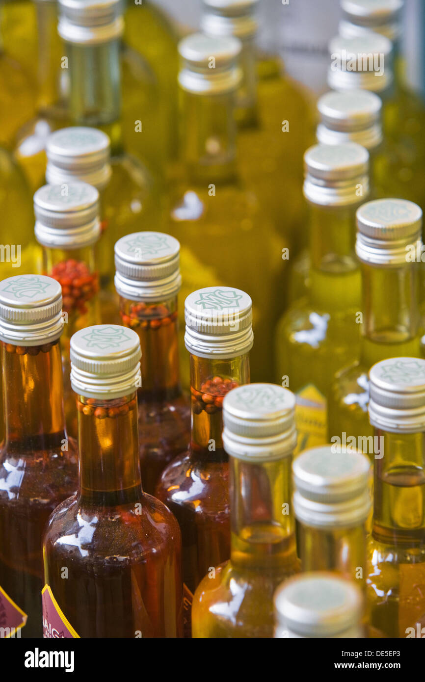 Bottles of vinegar on display on market Stock Photo - Alamy