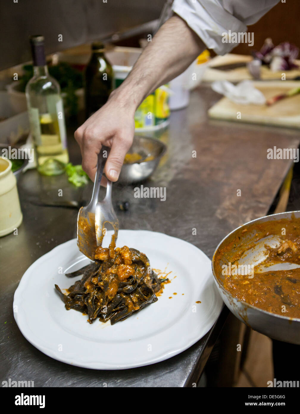 Food being prepared in a restaurant kitchen Stock Photo - Alamy