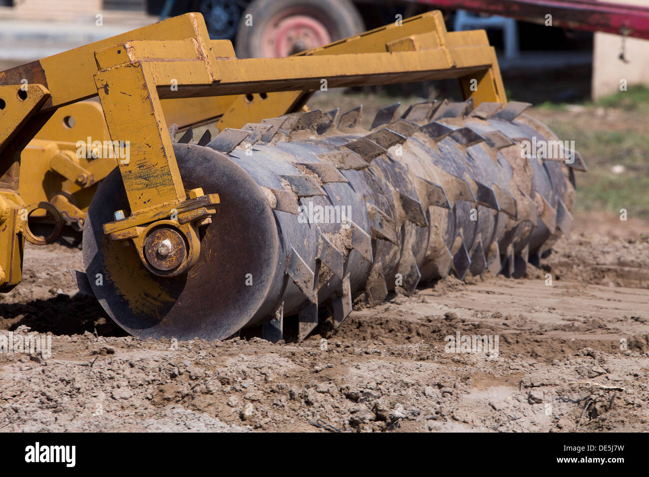 Roll tractor to level the fields Stock Photo - Alamy