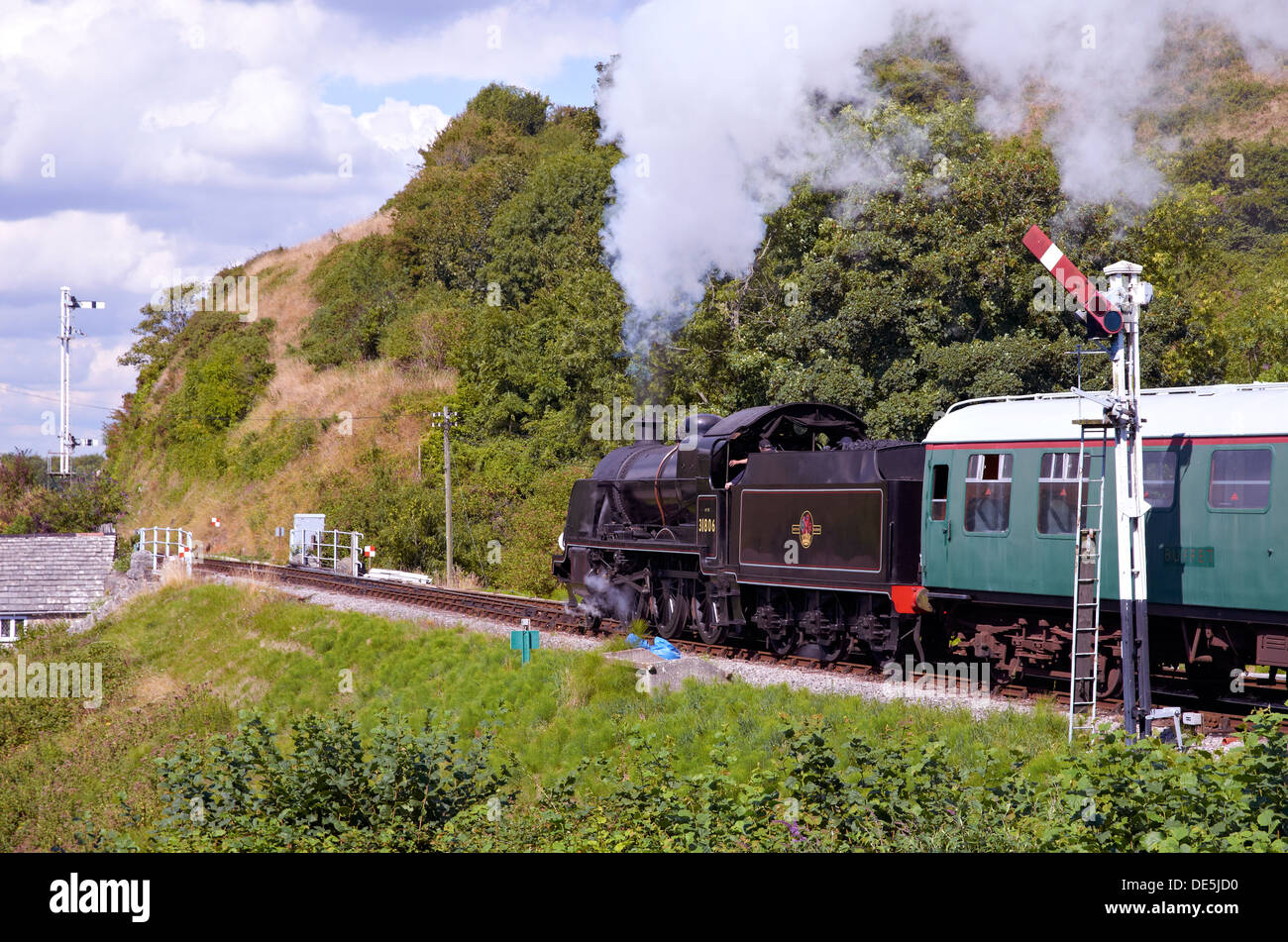 Steam train on the Swanage Railway leaving Corfe Castle station, Dorset ...
