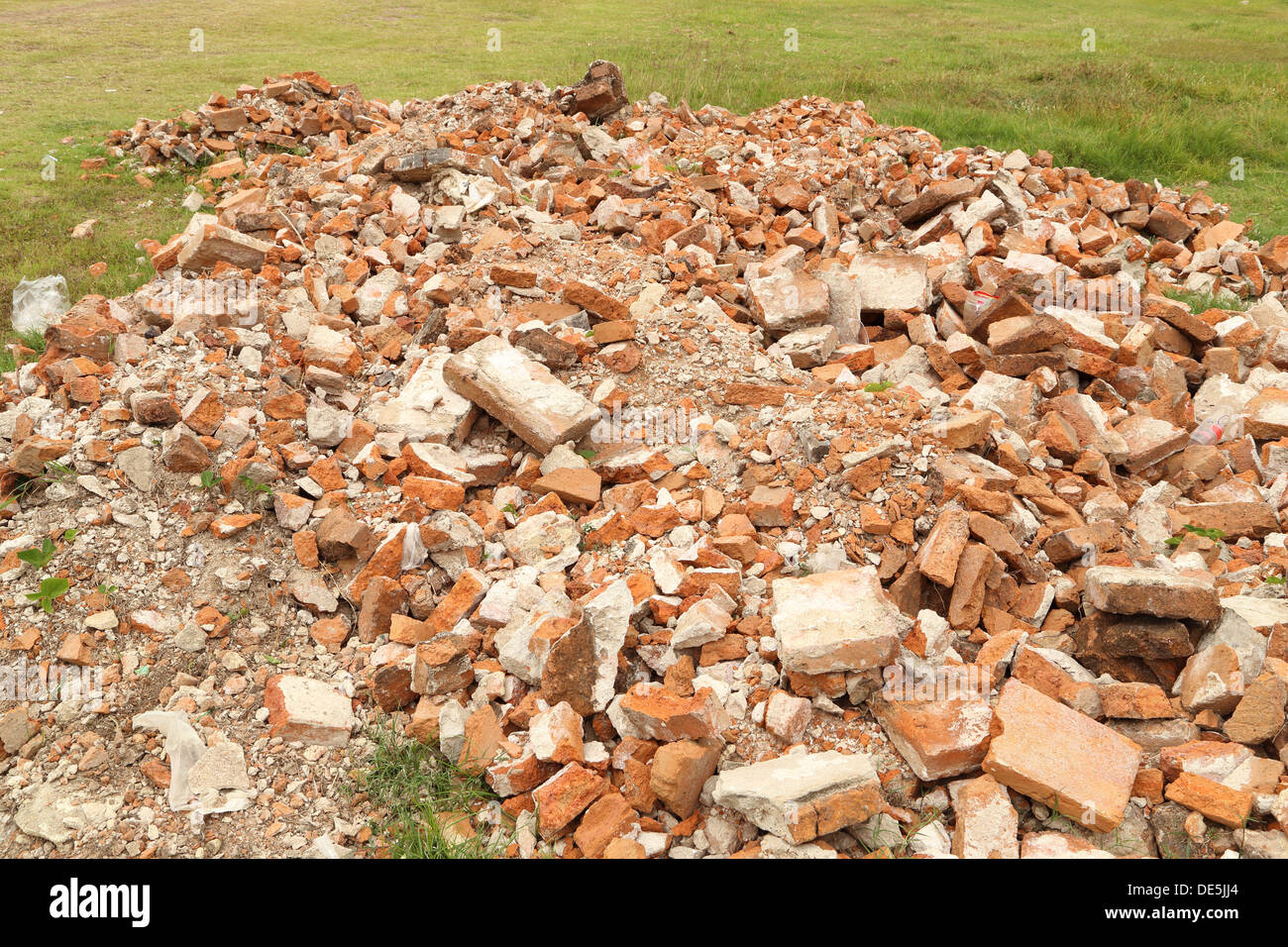 Pile of demolished brick wall Stock Photo - Alamy