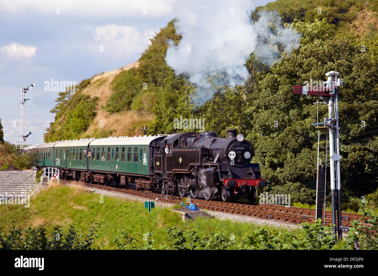 Steam train on the Swanage Railway running into Corfe Castle station ...