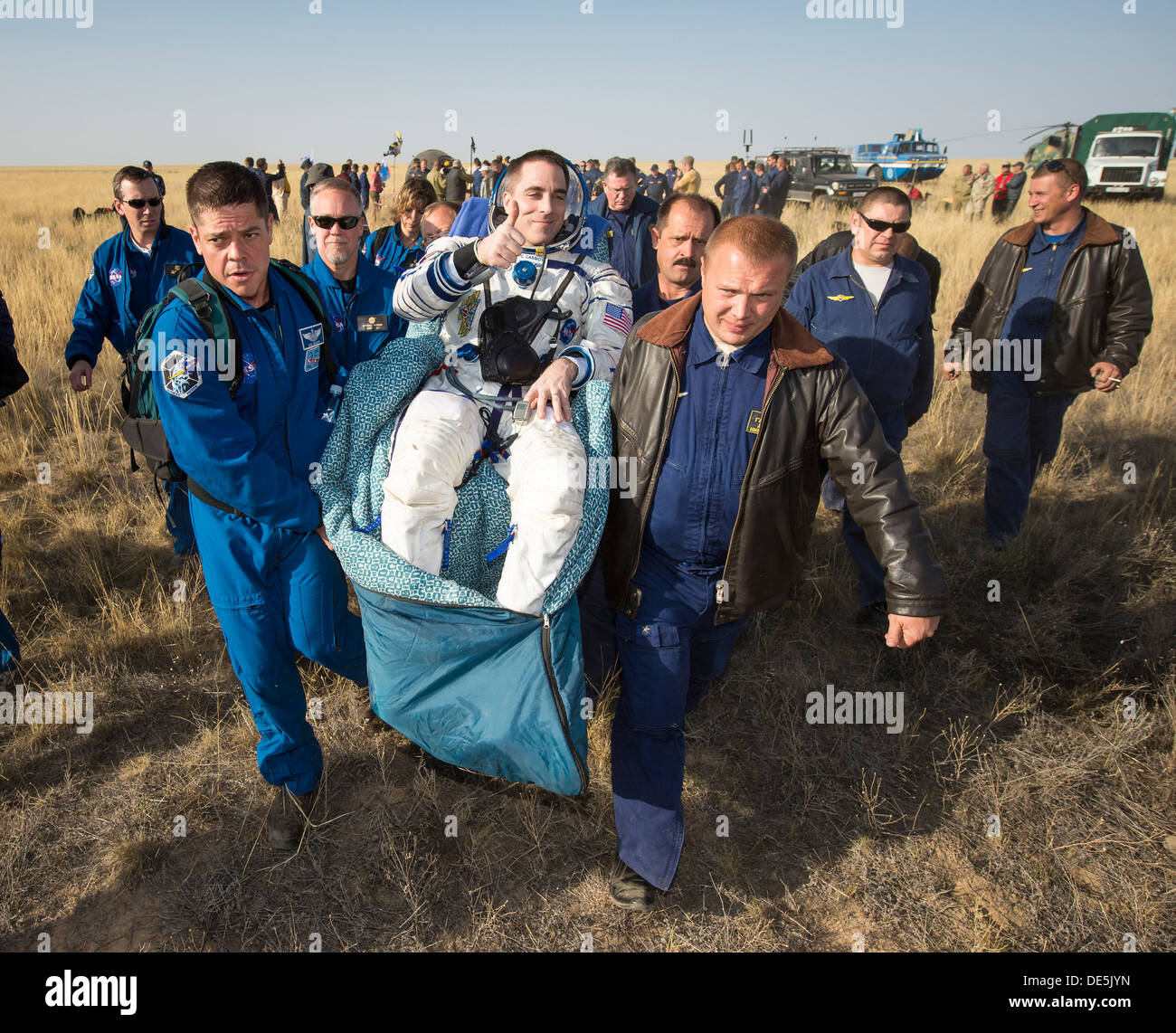 Expedition 36 astronauts Chris Cassidy, Alexander Samokutyaev, and Oleg ...
