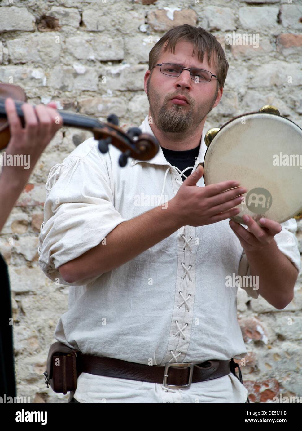 Playing tambourine hi-res stock photography and images - Alamy
