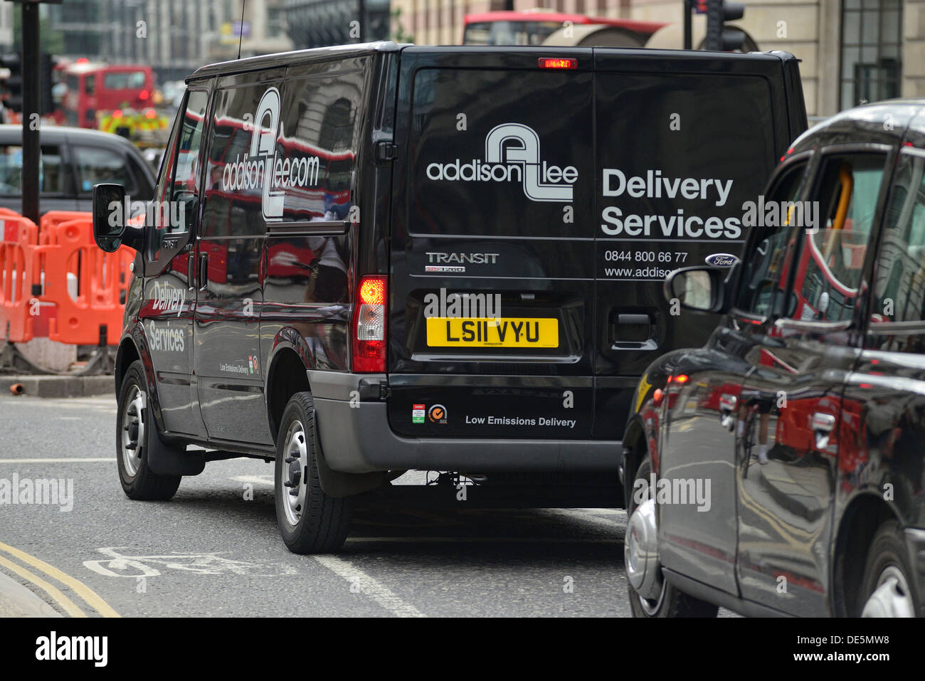 Van at traffic lights hi-res stock photography and images - Alamy