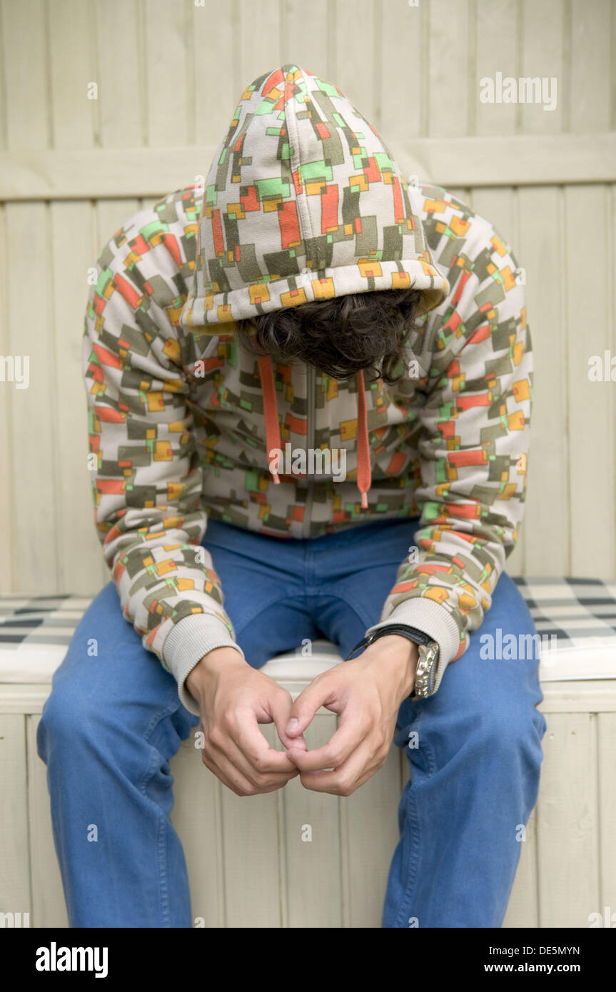 Man down head sad sitting hi-res stock photography and images - Alamy