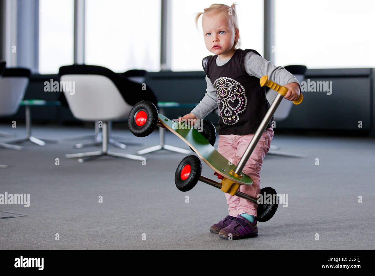 Bella carries a scooter 'Mingo' of Austrian producer Educational Toy ...