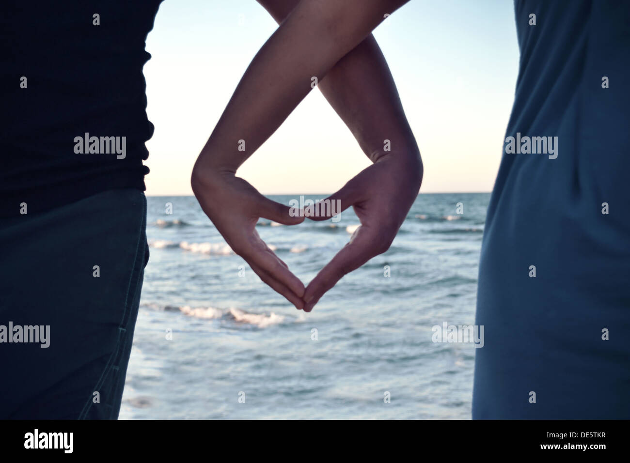 Couple hand heart hi-res stock photography and images - Alamy