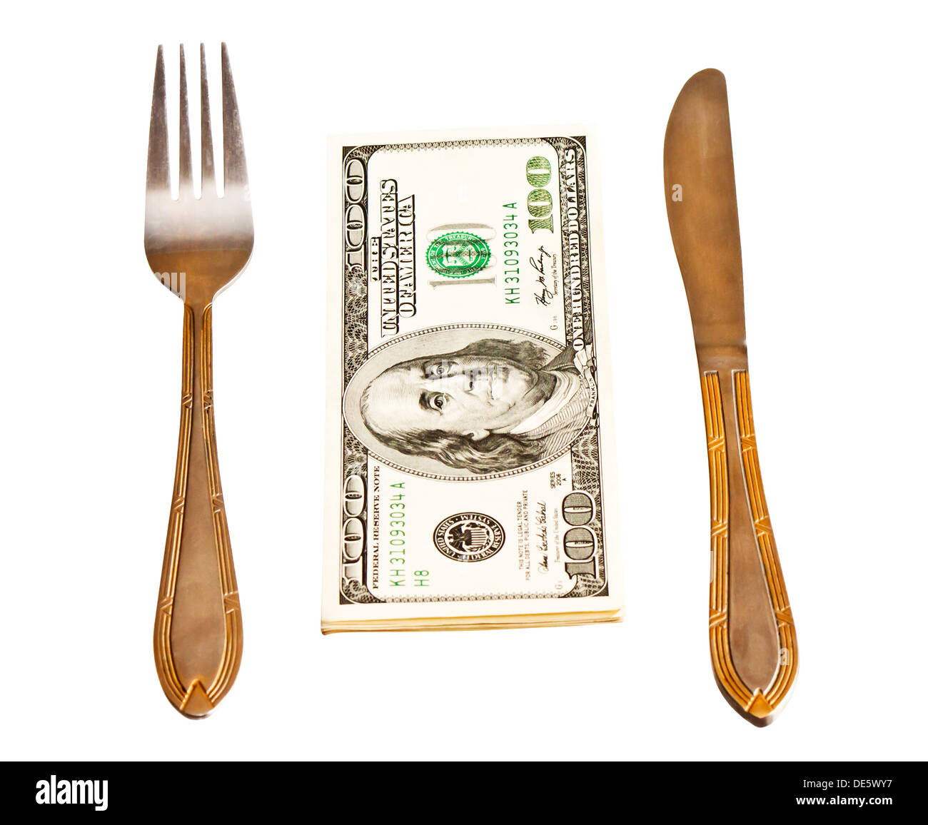 Money with fork and knife, isolated on white background Stock Photo - Alamy