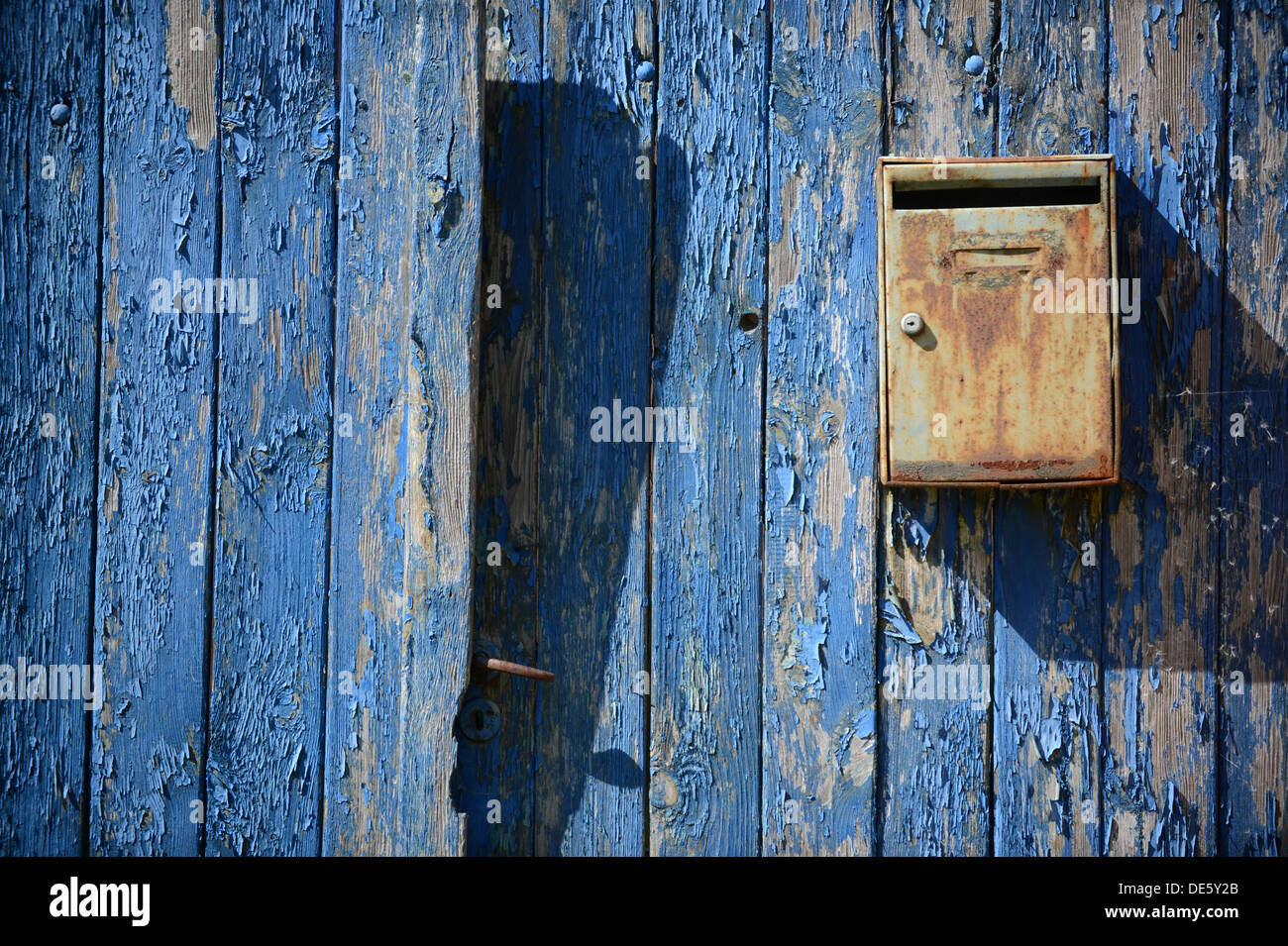Blue gate with peeling paint hi-res stock photography and images - Alamy