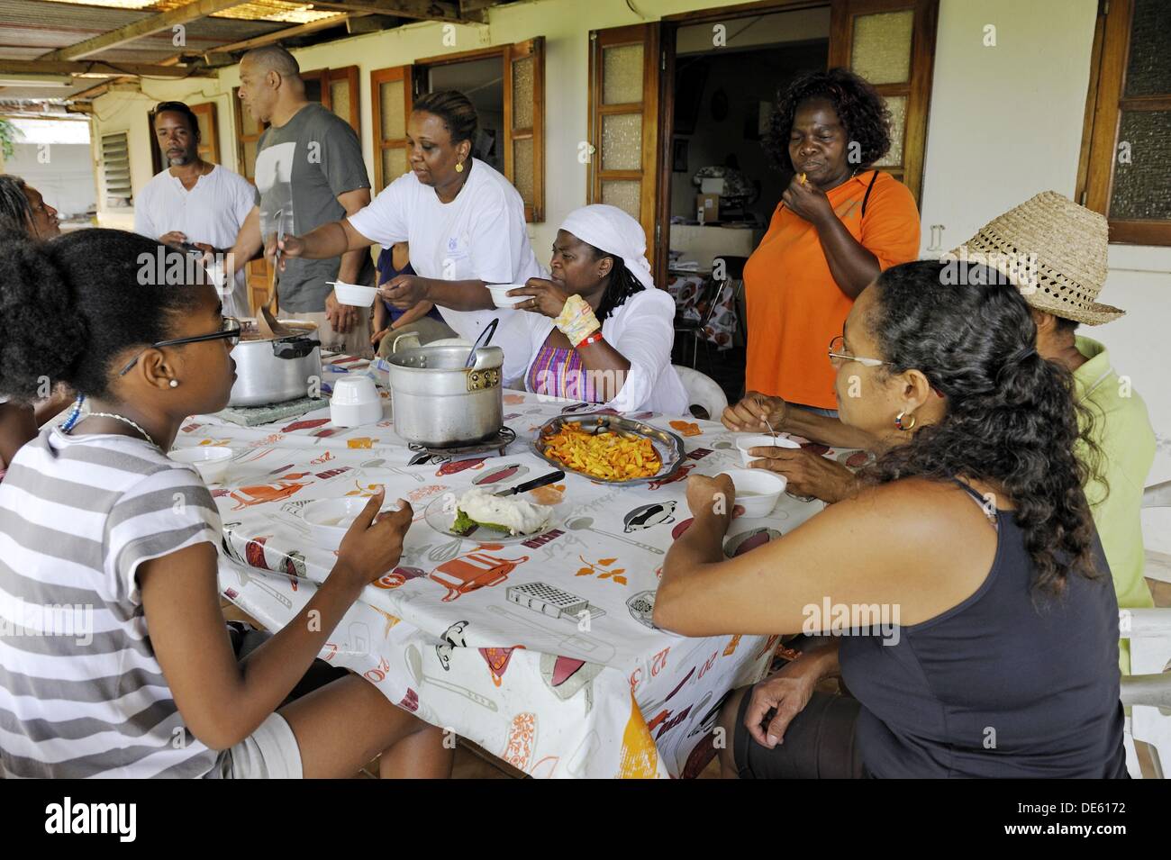 Caribbean family meal at home hi-res stock photography and images - Alamy