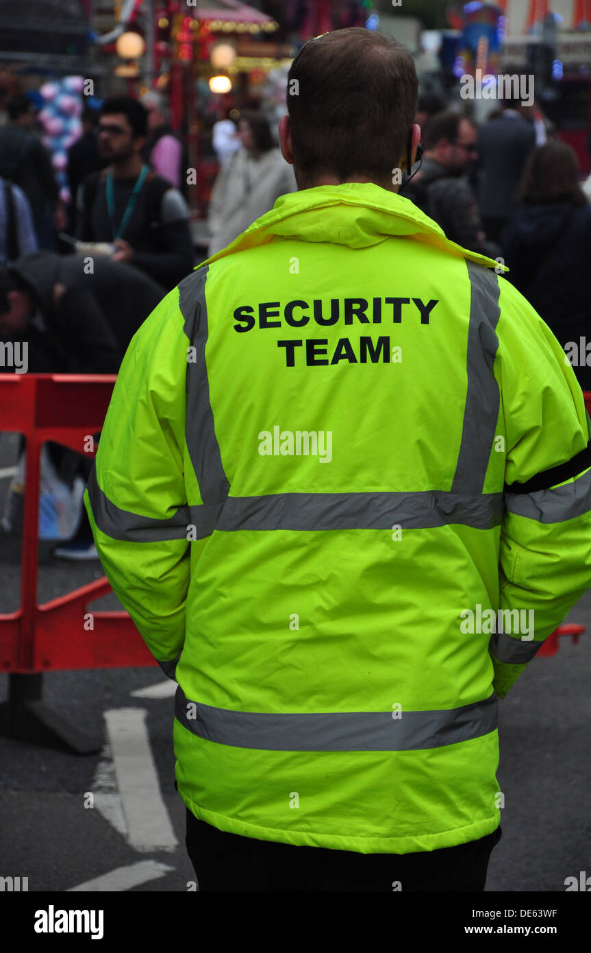 Security guard, St. Giles Fair, Oxford Stock Photo - Alamy