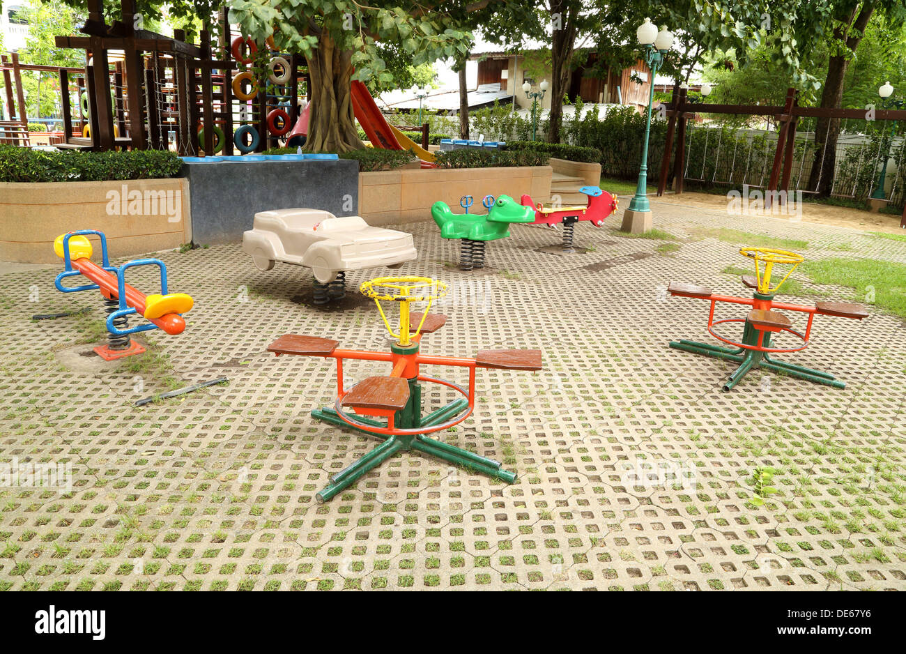 Children Carousel in the playground Stock Photo - Alamy