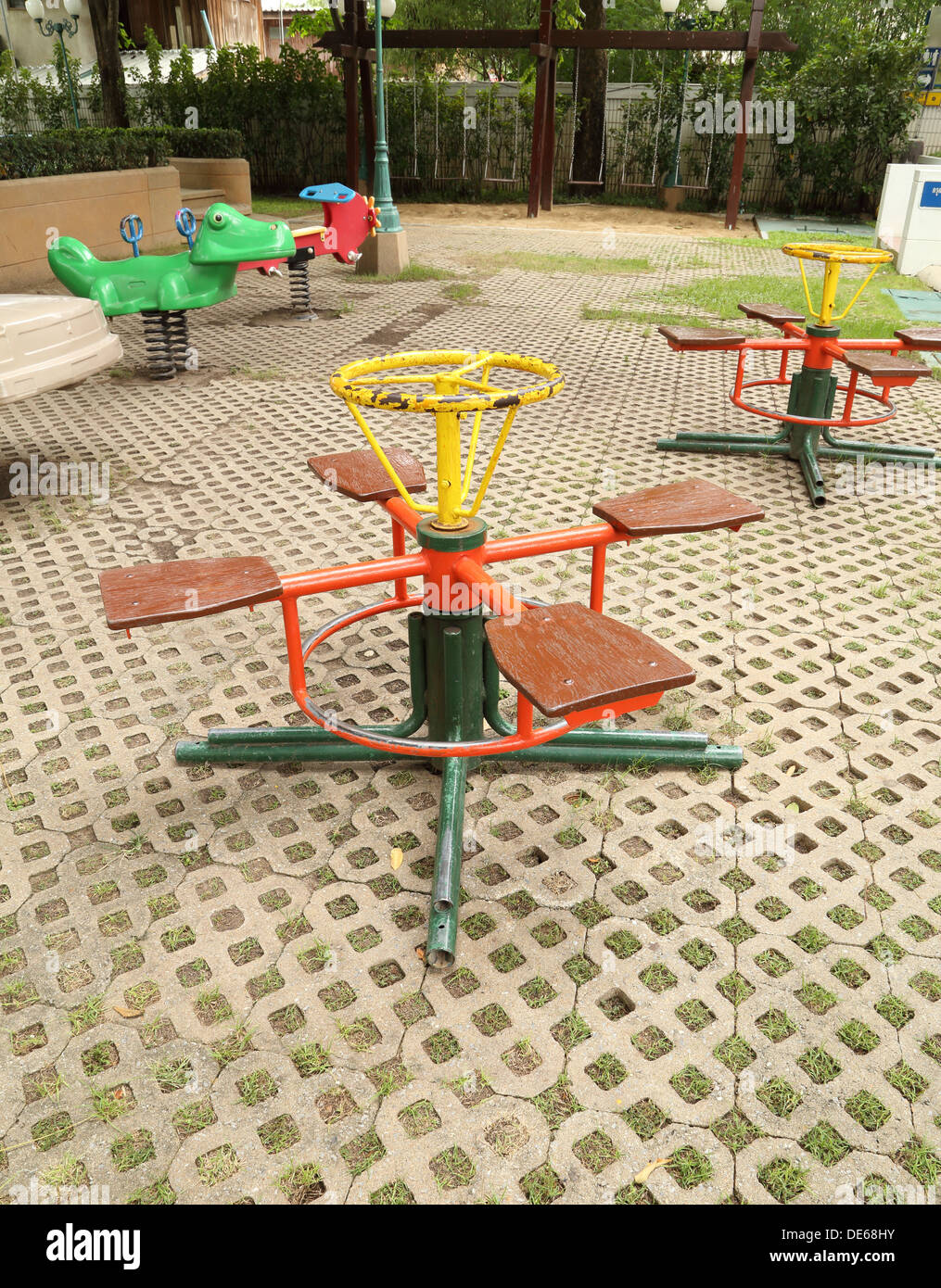 Children Carousel in the playground Stock Photo - Alamy