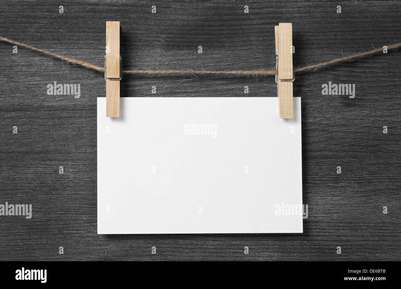 paper card hanging on the rope, blank Stock Photo - Alamy
