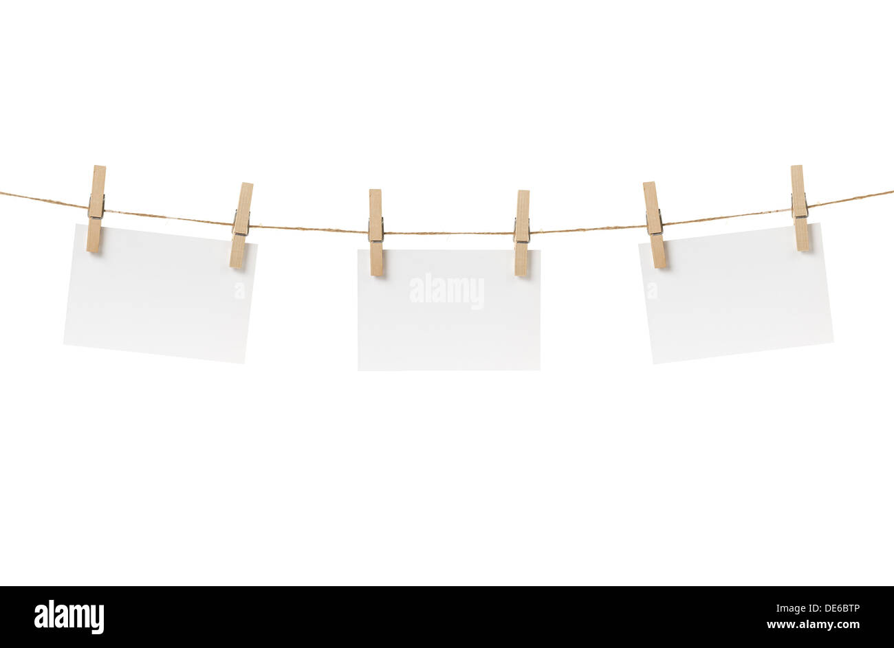 paper cards hanging on the rope, isolated Stock Photo - Alamy