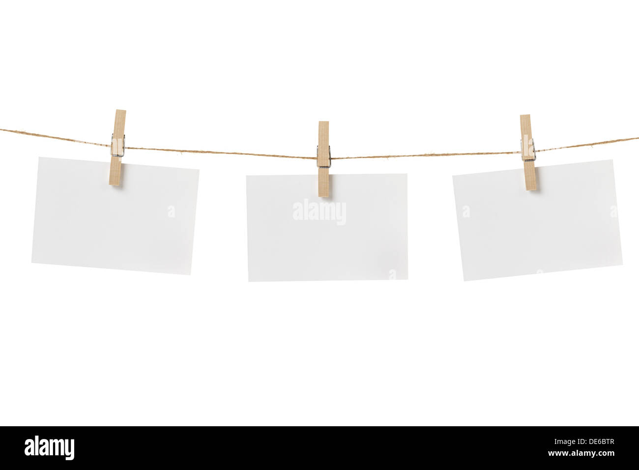 paper cards hanging on the rope, isolated Stock Photo - Alamy