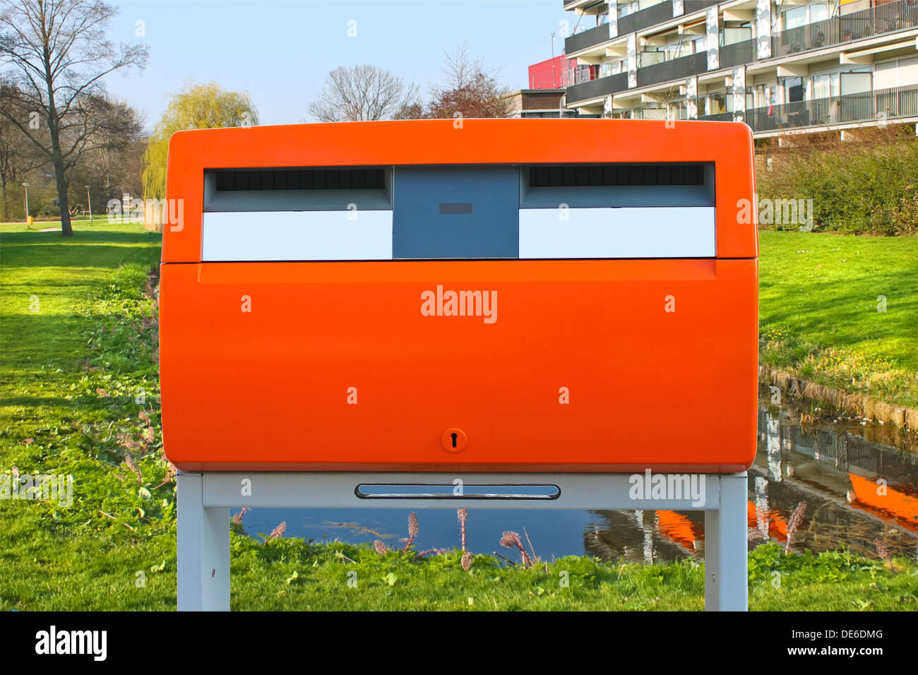 Dutch public orange mailbox on a city street. Netherlands Stock Photo ...