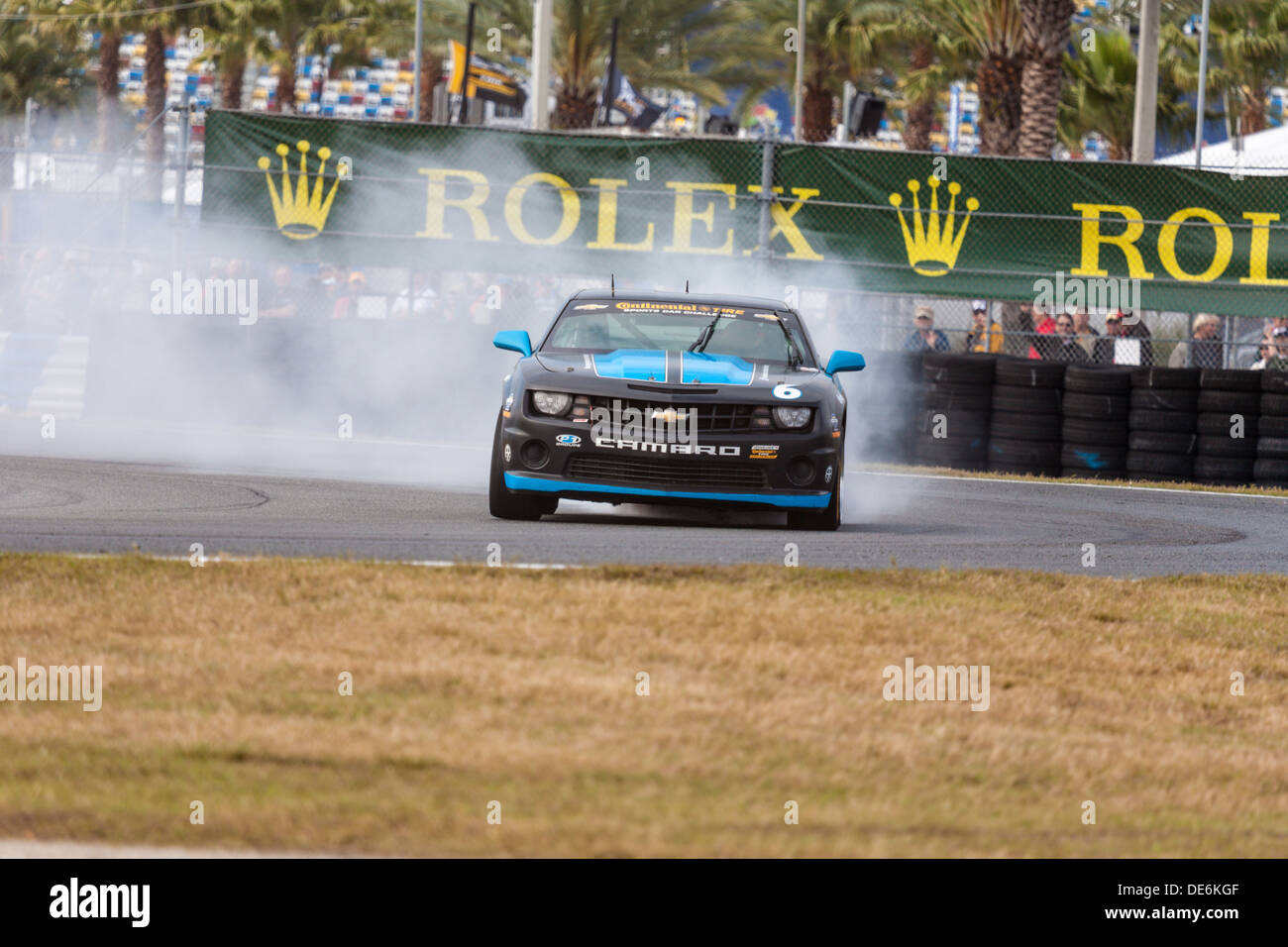 Chevy Camaro race car rounding a corner at Daytona International ...