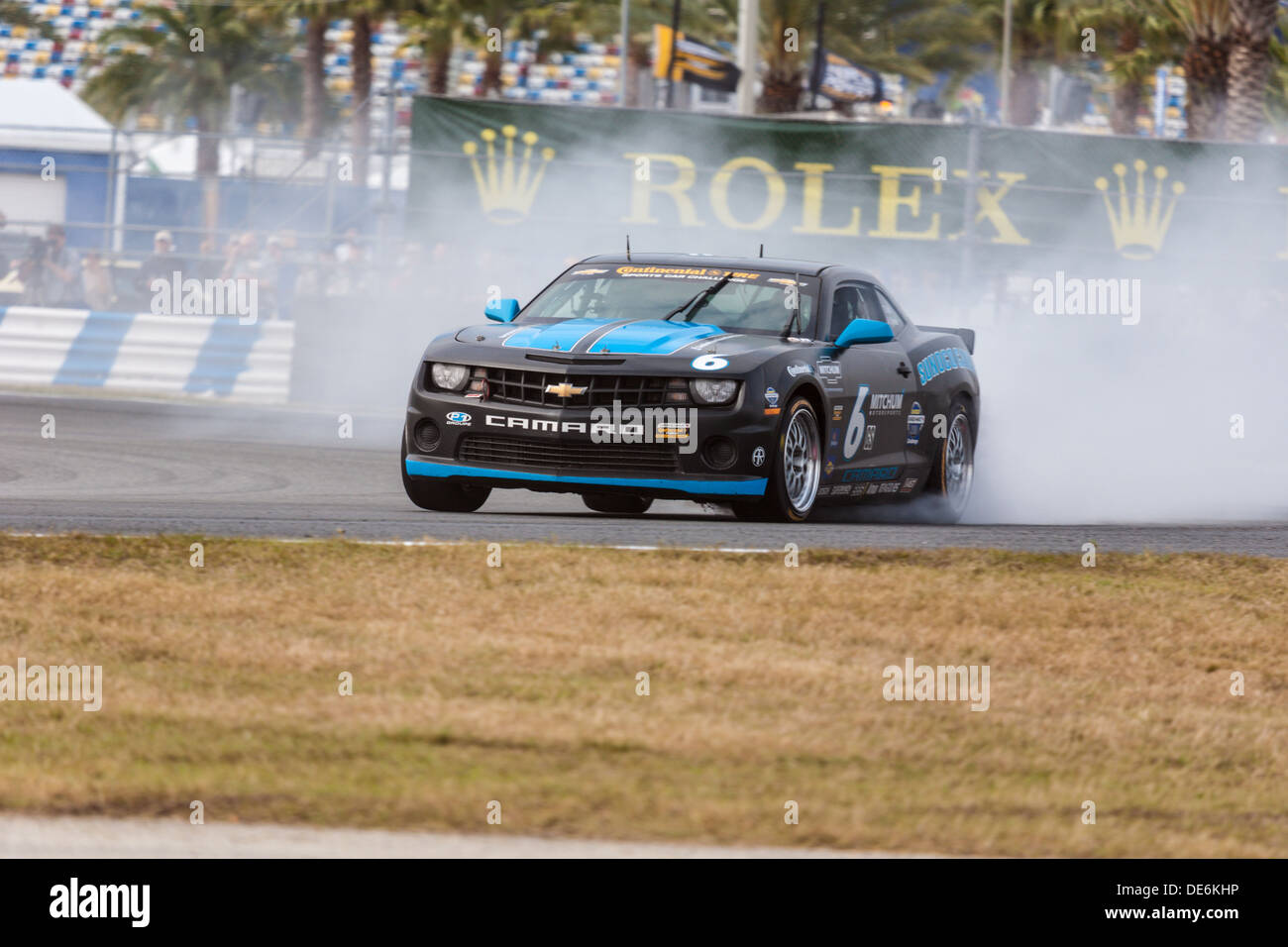 Chevy Camaro race car rounding a corner at Daytona International ...