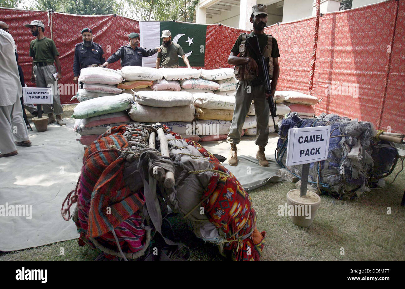 Security officials inspect recovered 6000 hi-res stock photography and ...