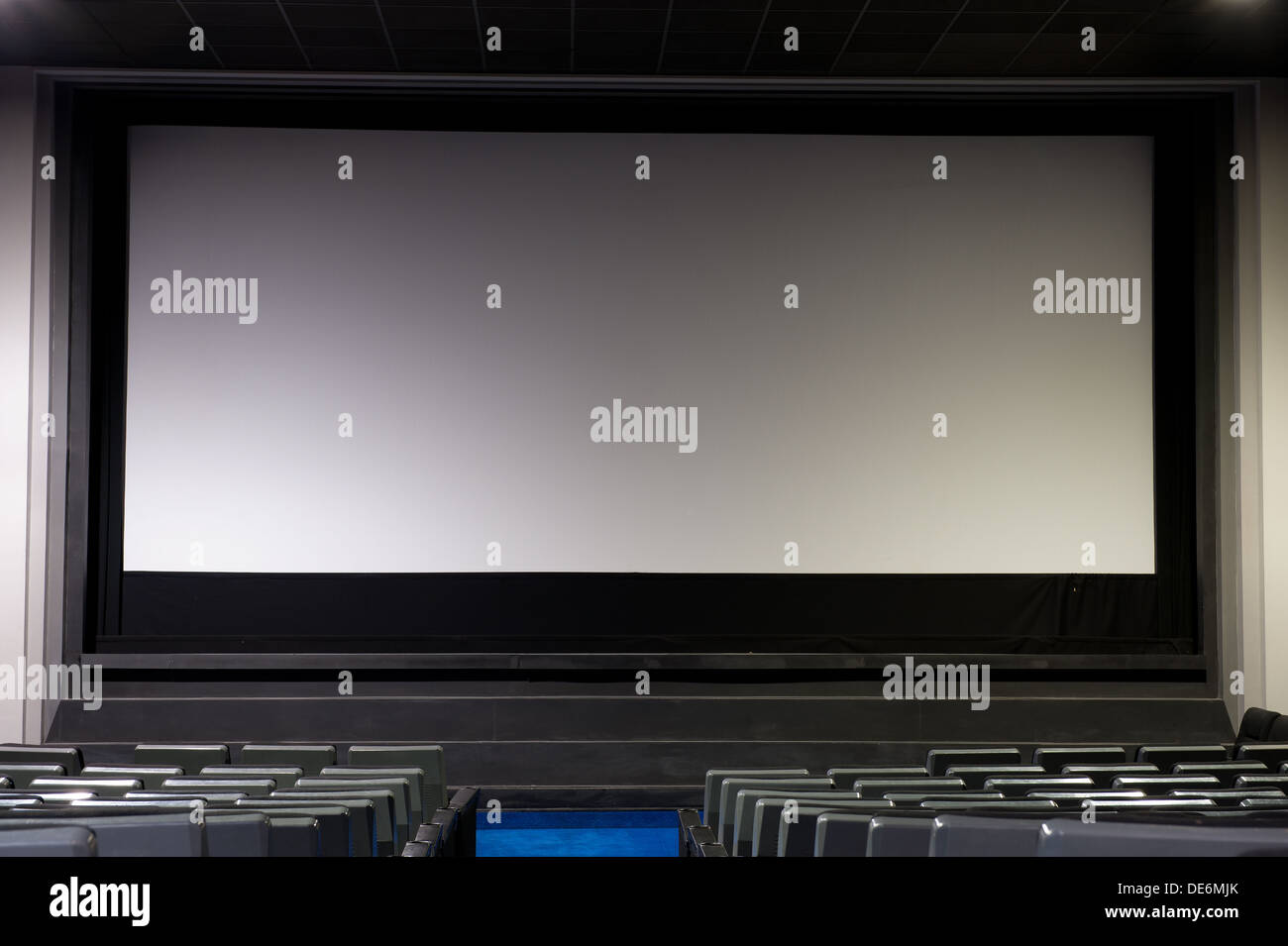 Blank cinema screen and an empty auditorium Stock Photo - Alamy