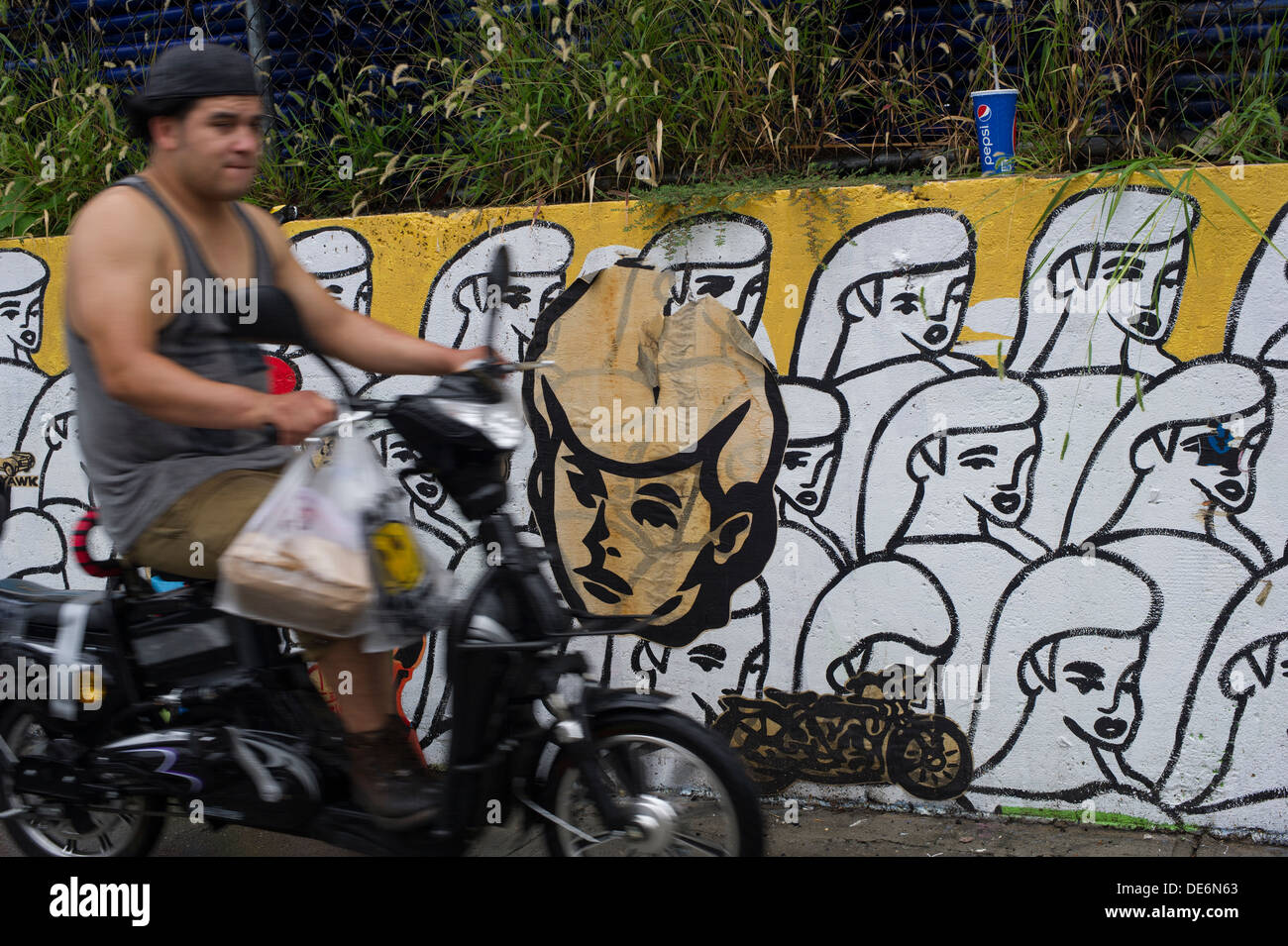 Murals grace the walls of the Welling Court Mural Project in the ...
