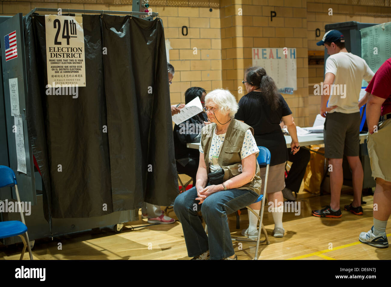 New Yorkers vote on Primary Day in the gym of PS 33 in the New York ...