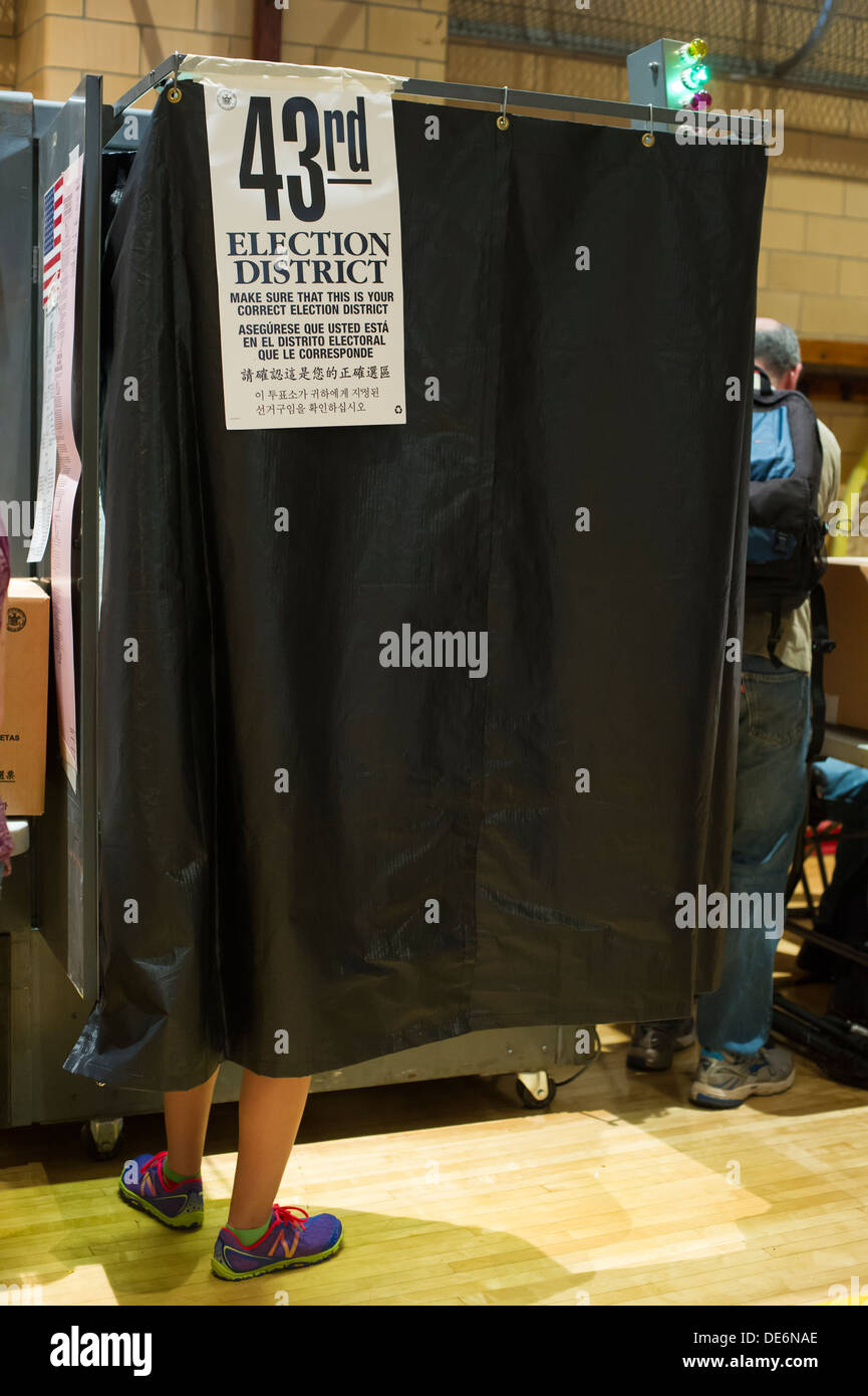 New Yorkers vote on Primary Day in the gym of PS 33 in the New York ...