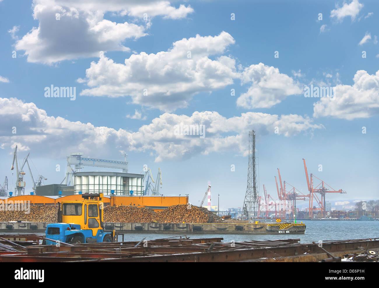 Timber on the pier in the port Stock Photo - Alamy