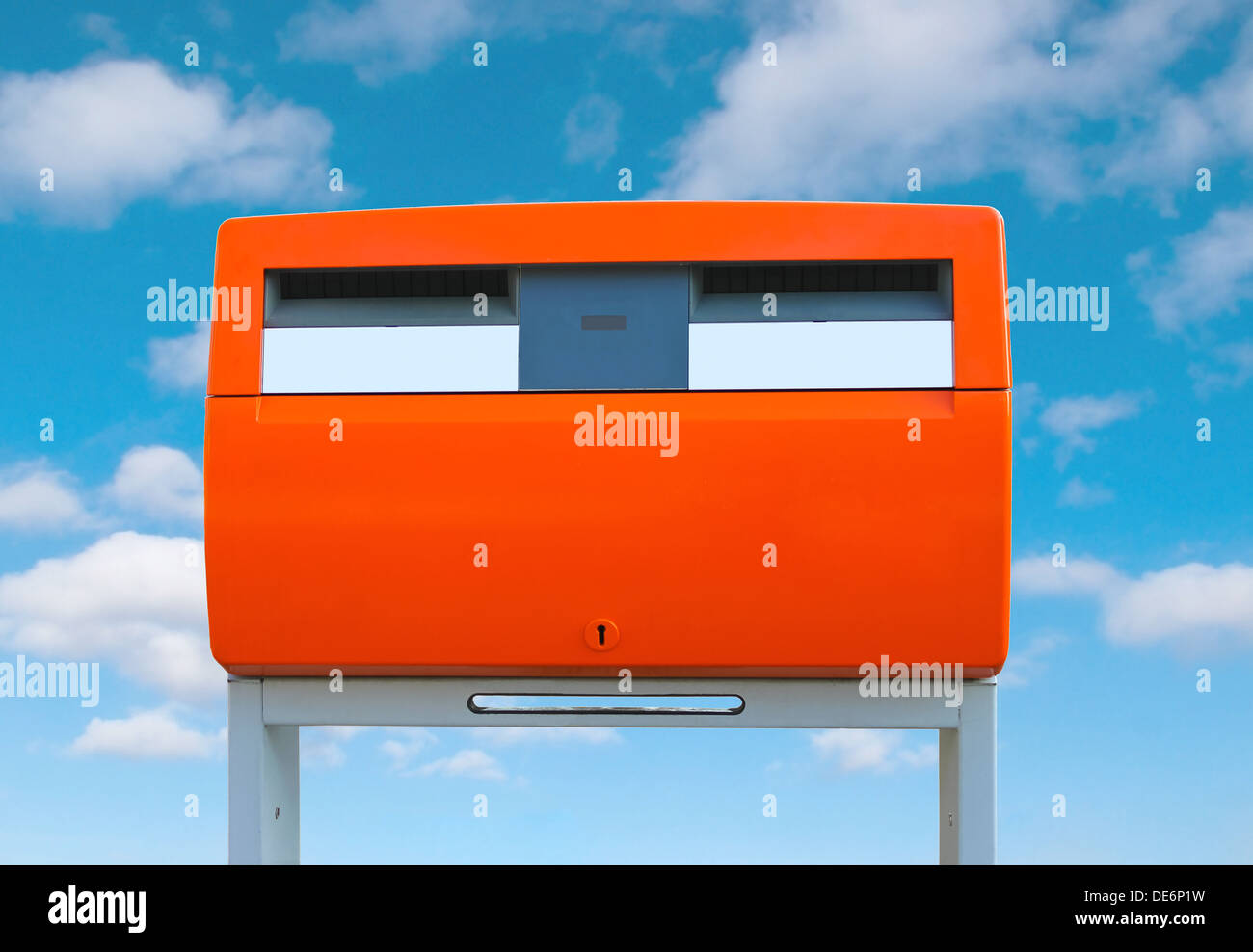 Dutch public mailbox orange on sky background Netherlands Stock Photo ...