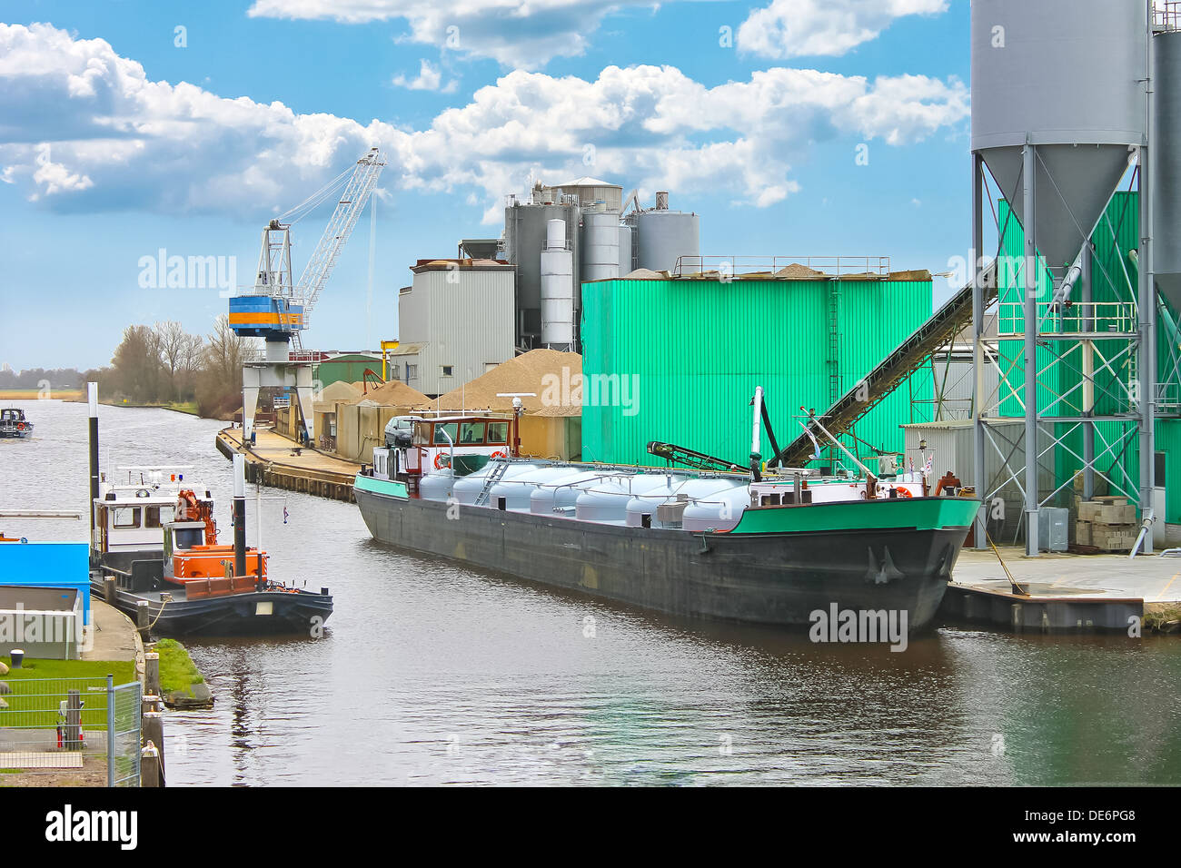 Ship in harbor of the cement plant. Netherlands Stock Photo - Alamy