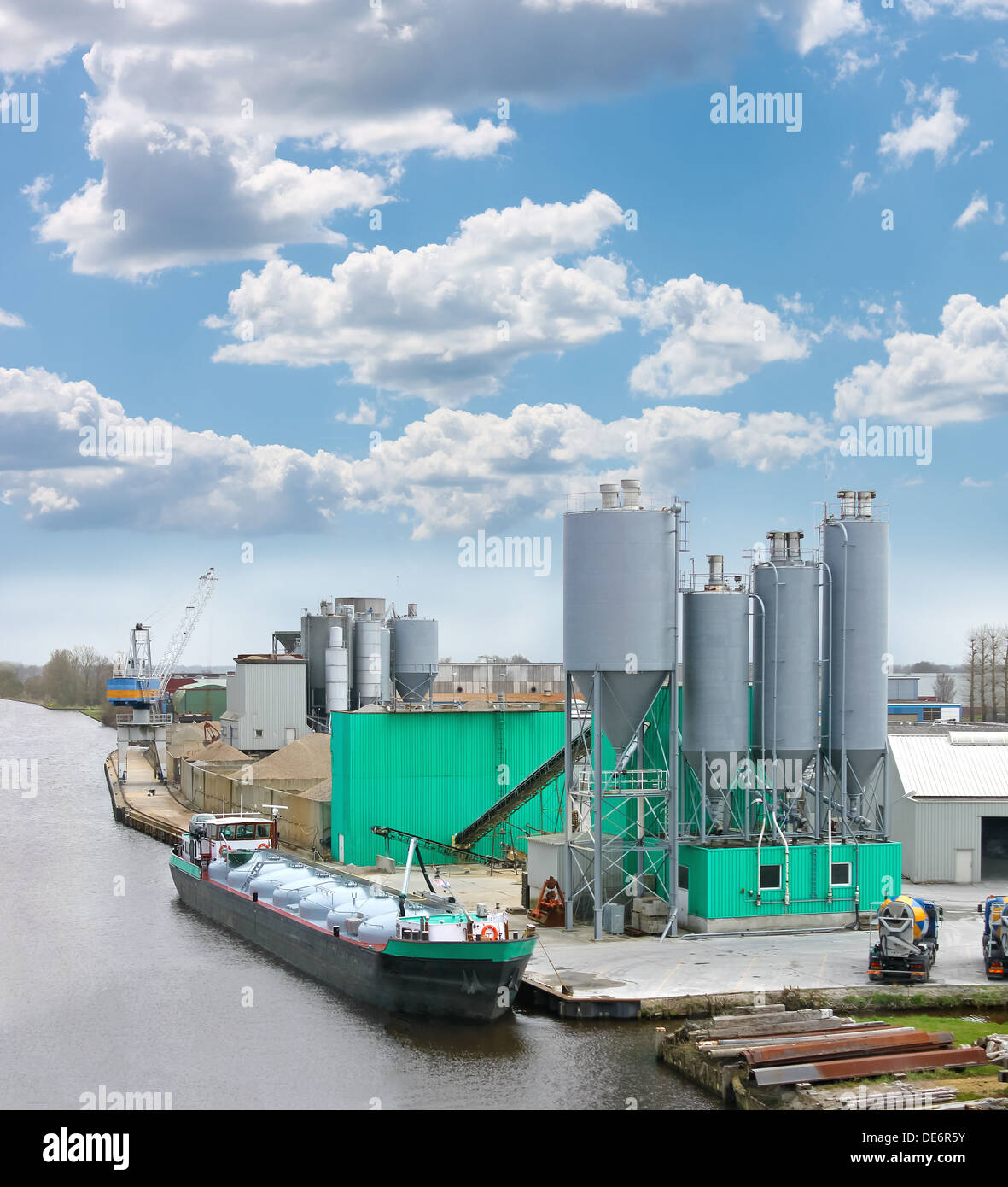 Ship in harbor of the cement plant. Netherlands Stock Photo - Alamy
