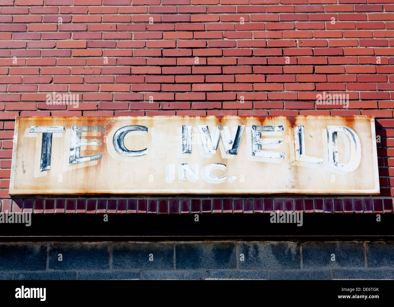 Rusted old store sign Stock Photo - Alamy