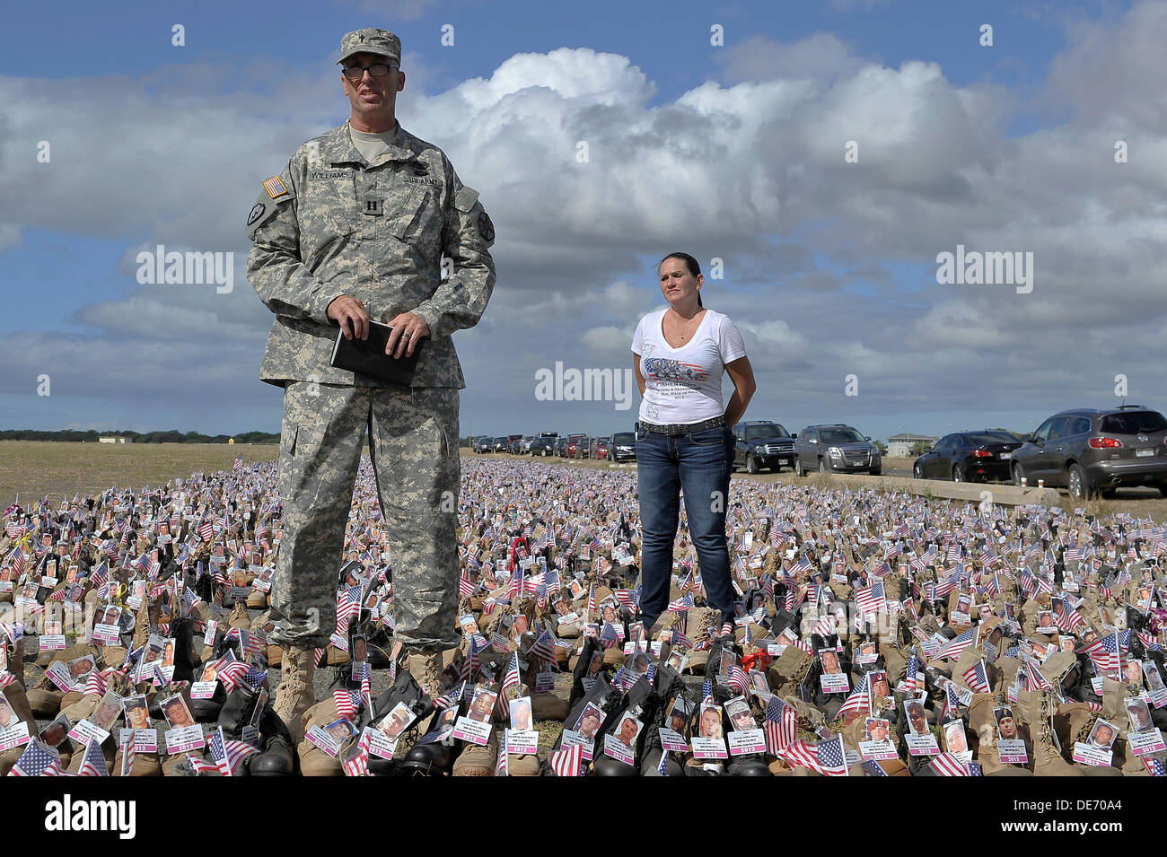 Combat boots with the names and pictures of those killed in the Iraq ...