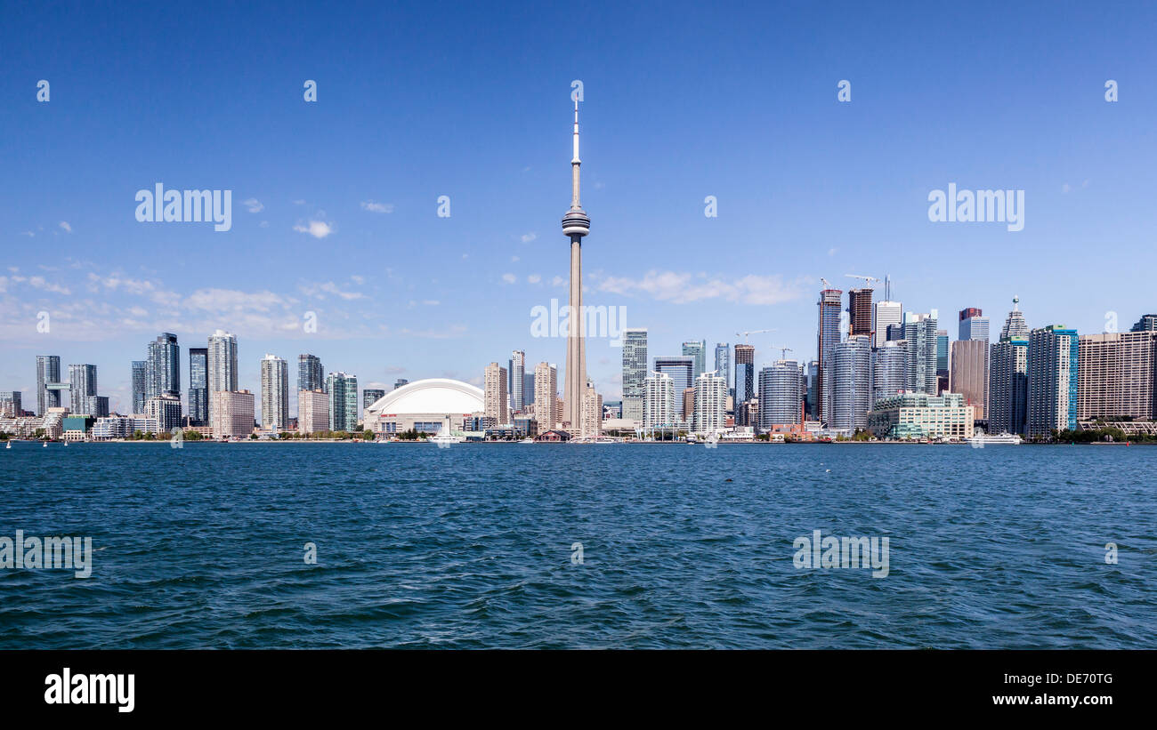 Blue sky view of Toronto skyline, Skyscrapers and CN tower from Lake ...