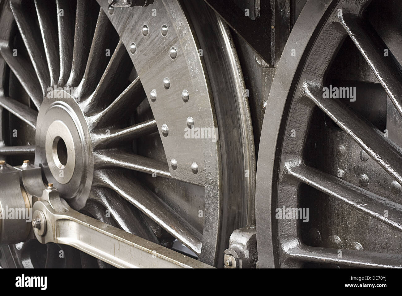 Steam train wheels close up detail shot of the chassis or running gear ...