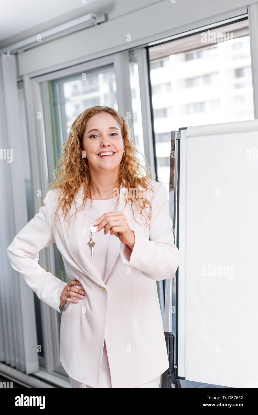 Attractive female real estate agent hi-res stock photography and images ...