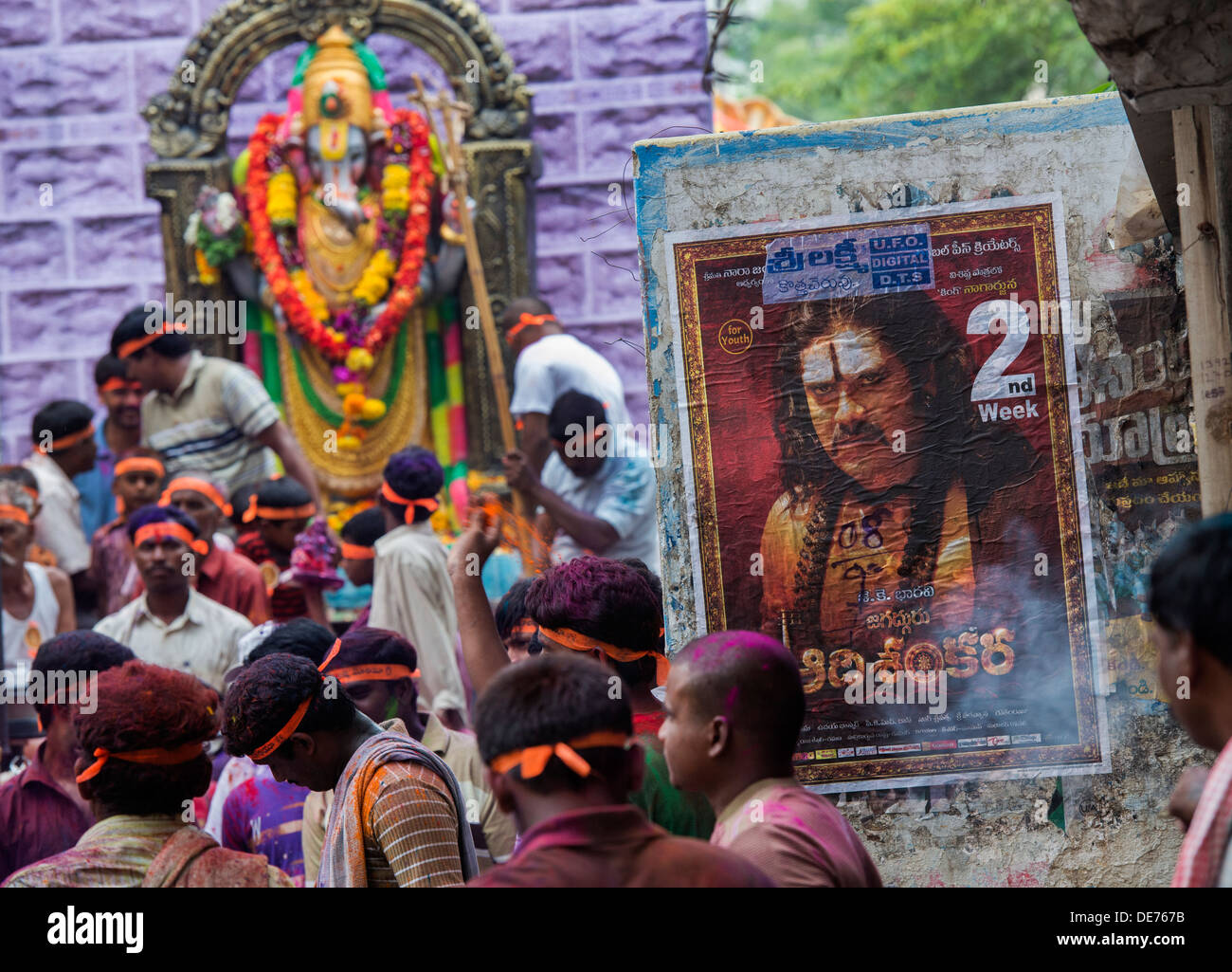 Indian people worshiping Lord Ganesha statue. Ganesha Chaturthi ...