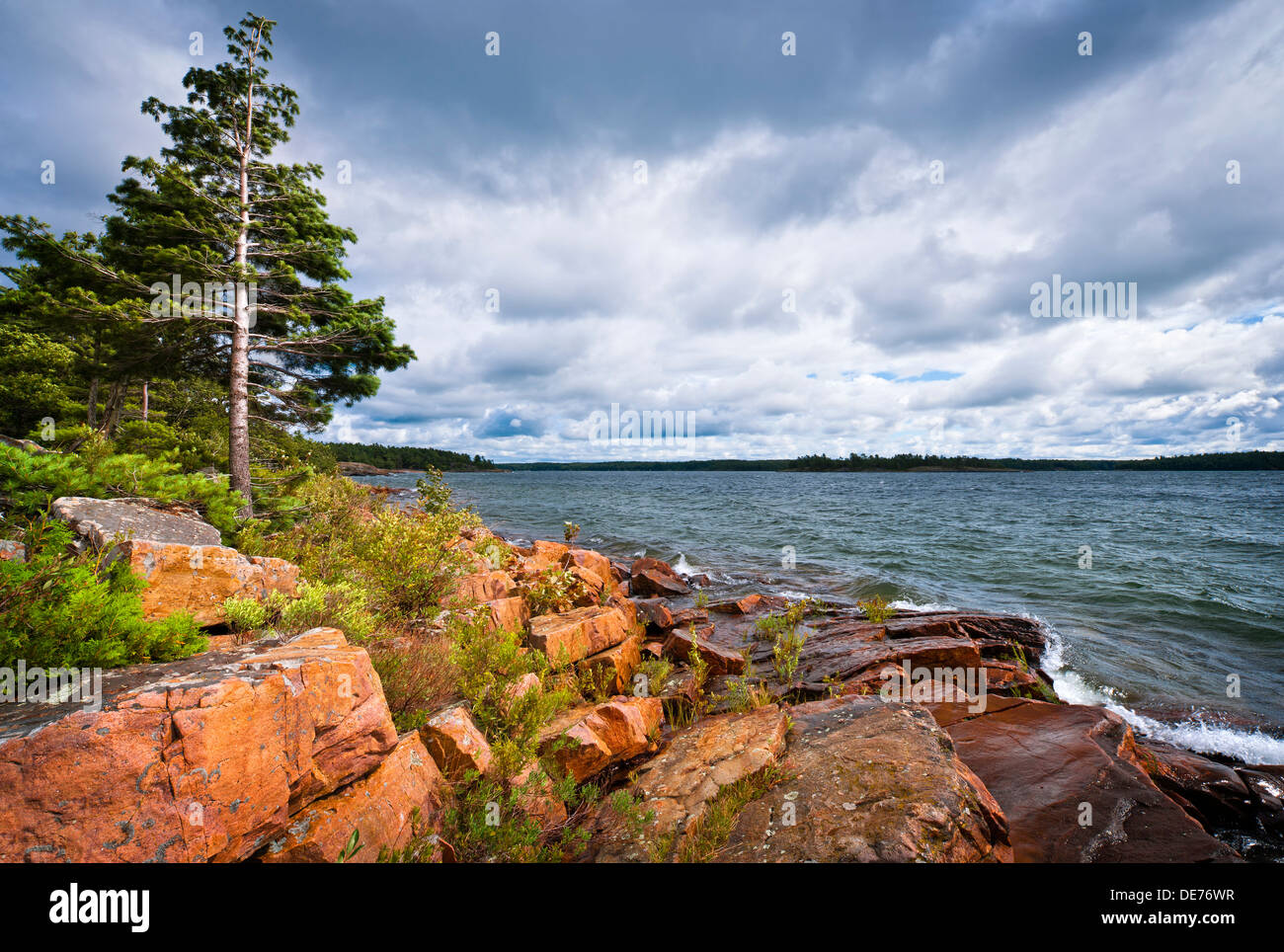 Rocky lake shore of Georgian Bay in Killbear provincial park near Parry ...