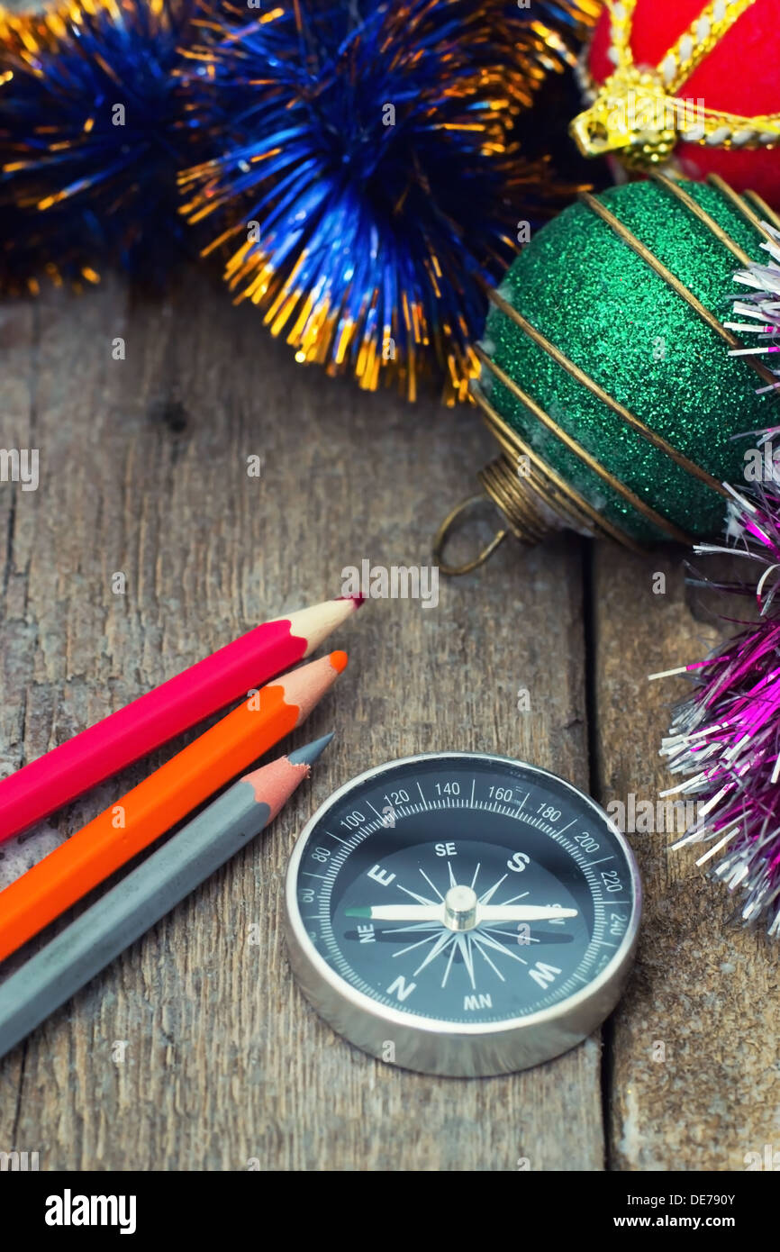 compass traveler and Christmas decorations Stock Photo - Alamy
