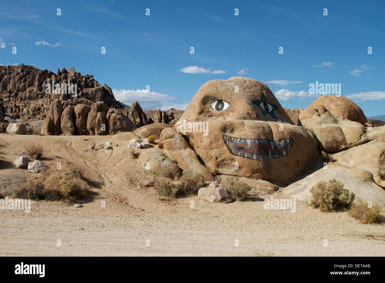 A painted boulder (biotite monzogranite) in the Alabama hills west of ...