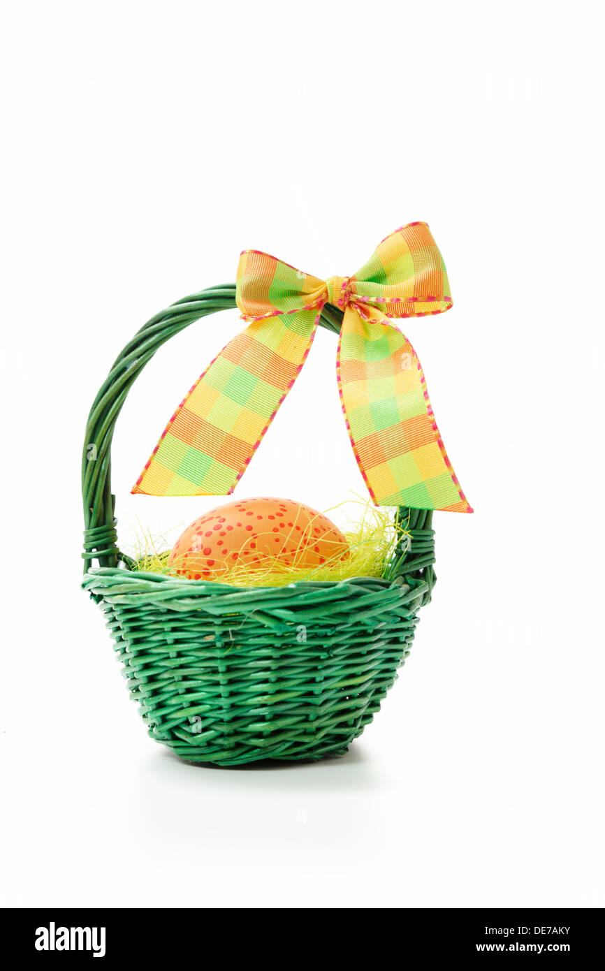 Easter egg in a basket Stock Photo - Alamy