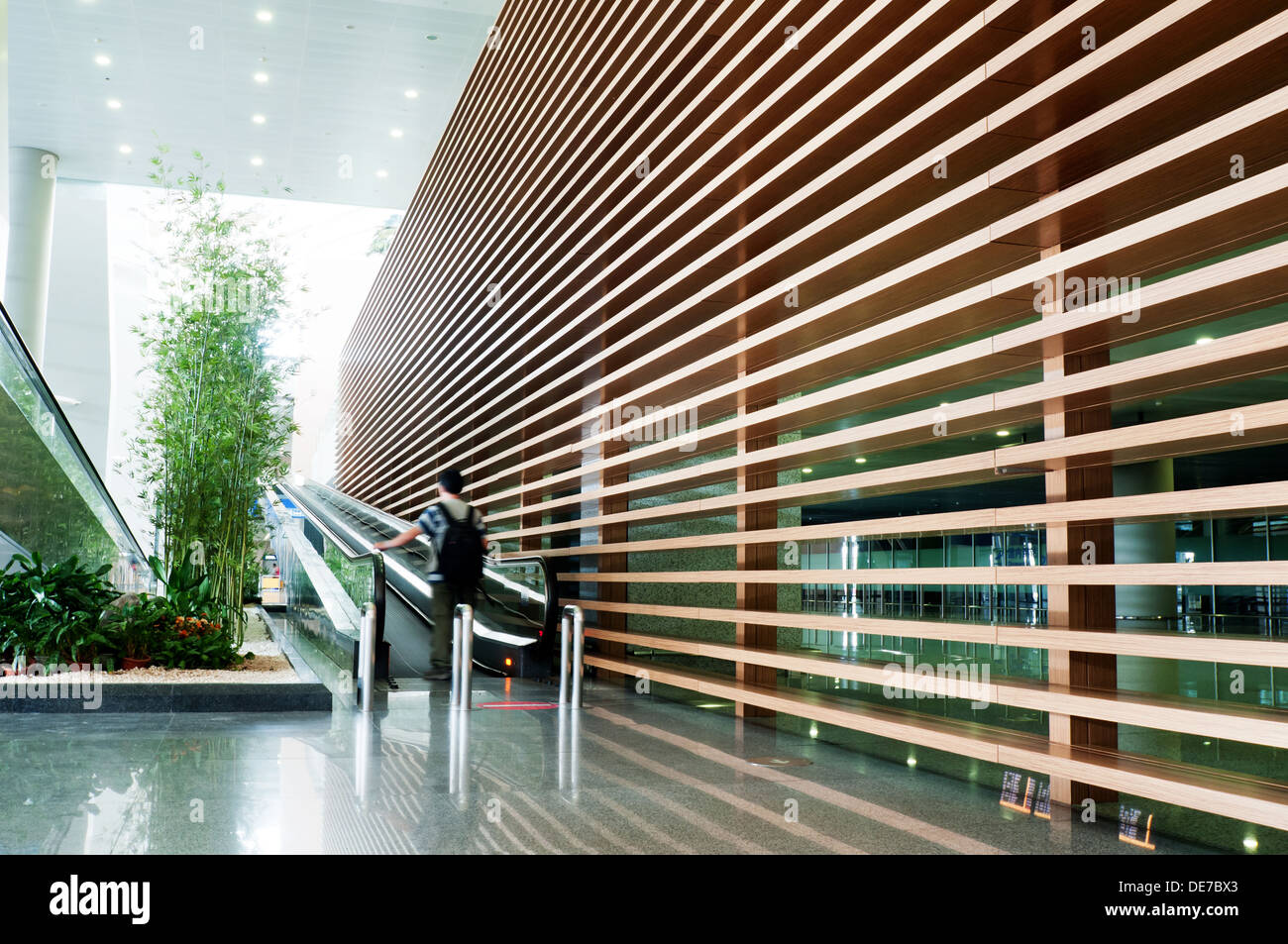 passenger rushing through an escalator in airport terminal Stock Photo ...