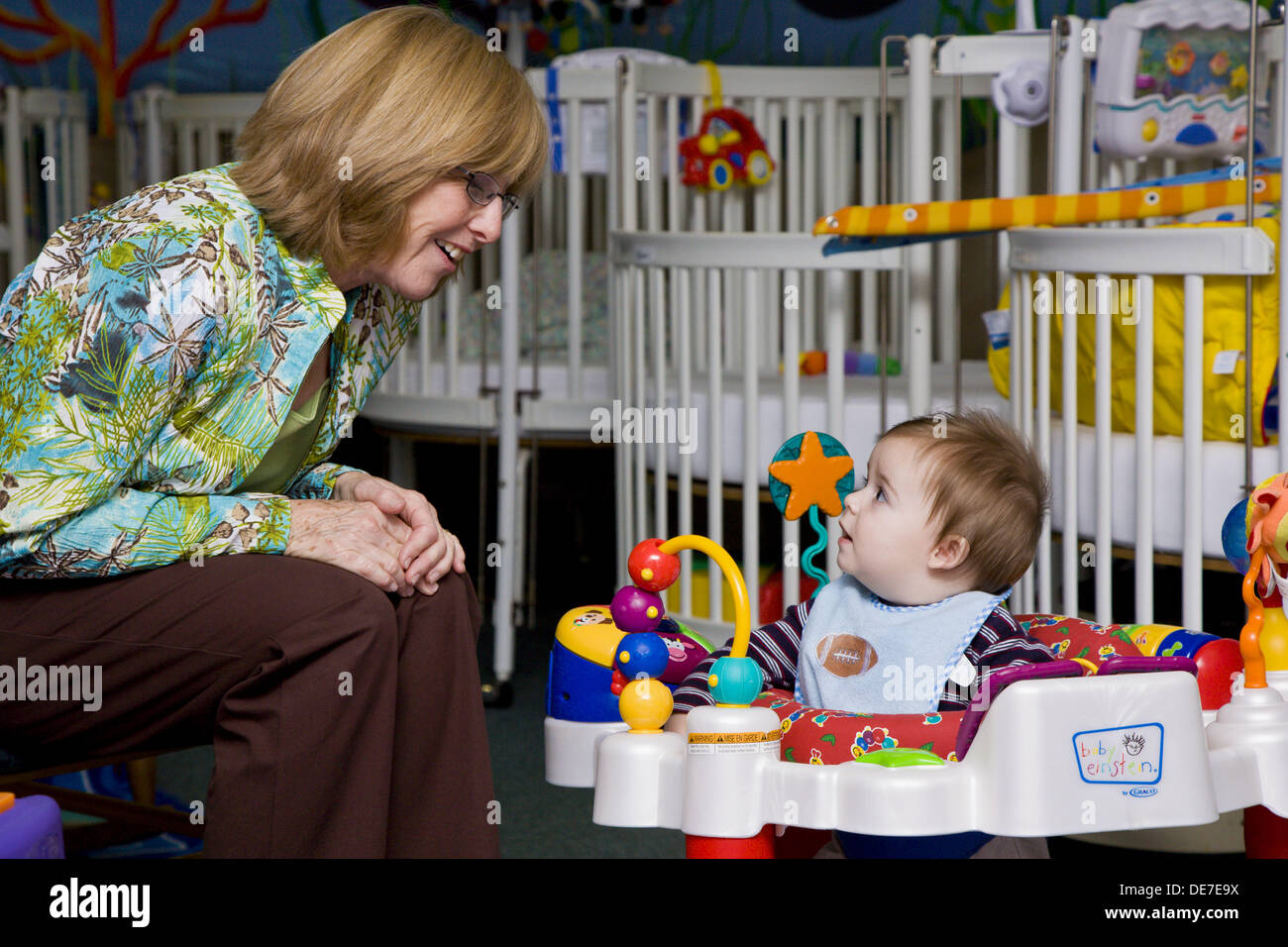Childcare worker baby hi-res stock photography and images - Alamy