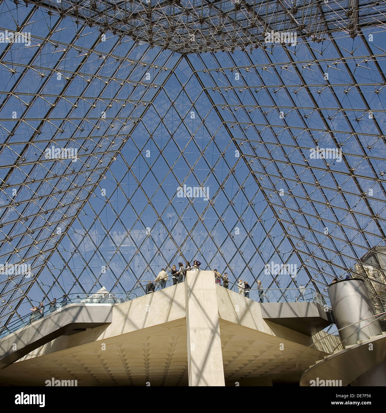 The new entrance to the Musee du Louvre, a pyramidal, glass structure ...