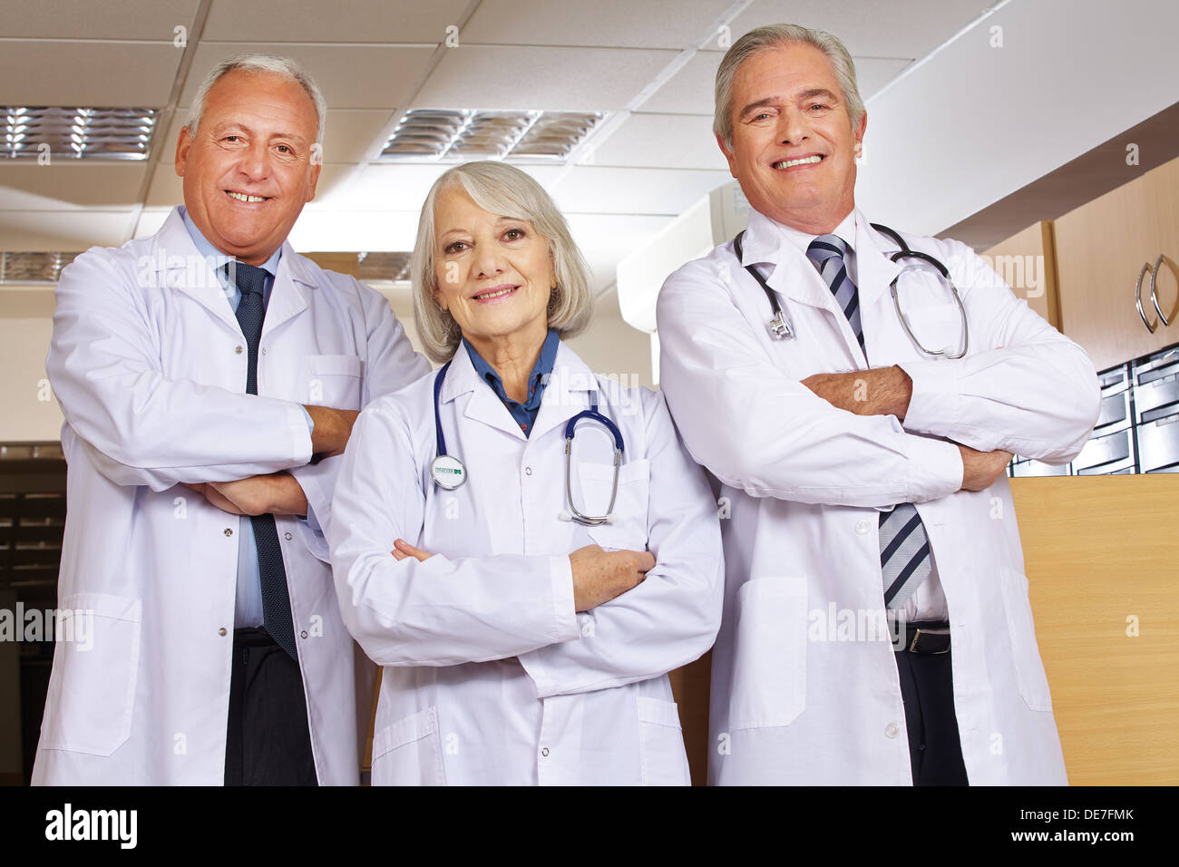 Portrait smiling doctor team hi-res stock photography and images - Alamy