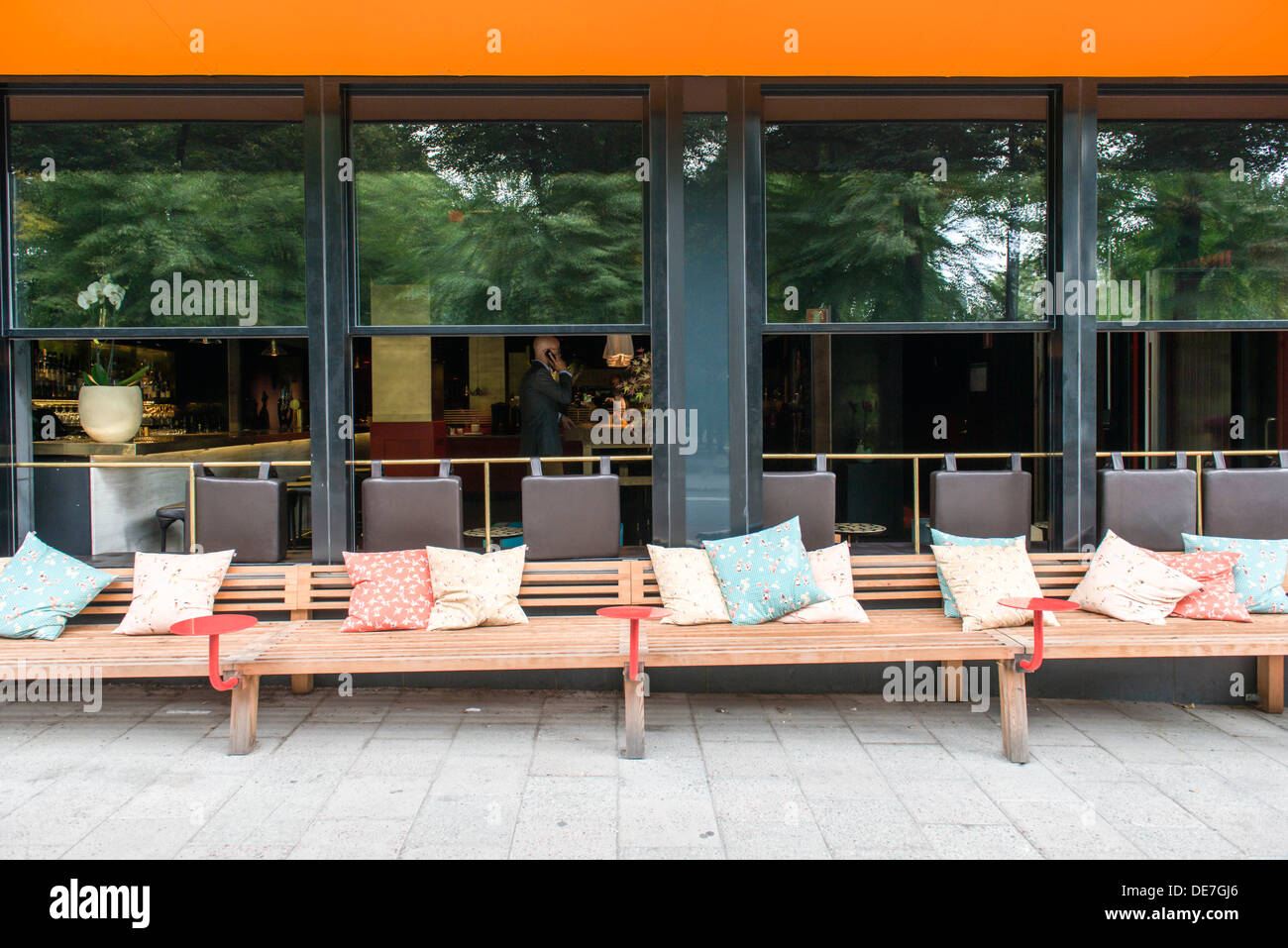 Benches outside a bar in Stockholm Stock Photo - Alamy